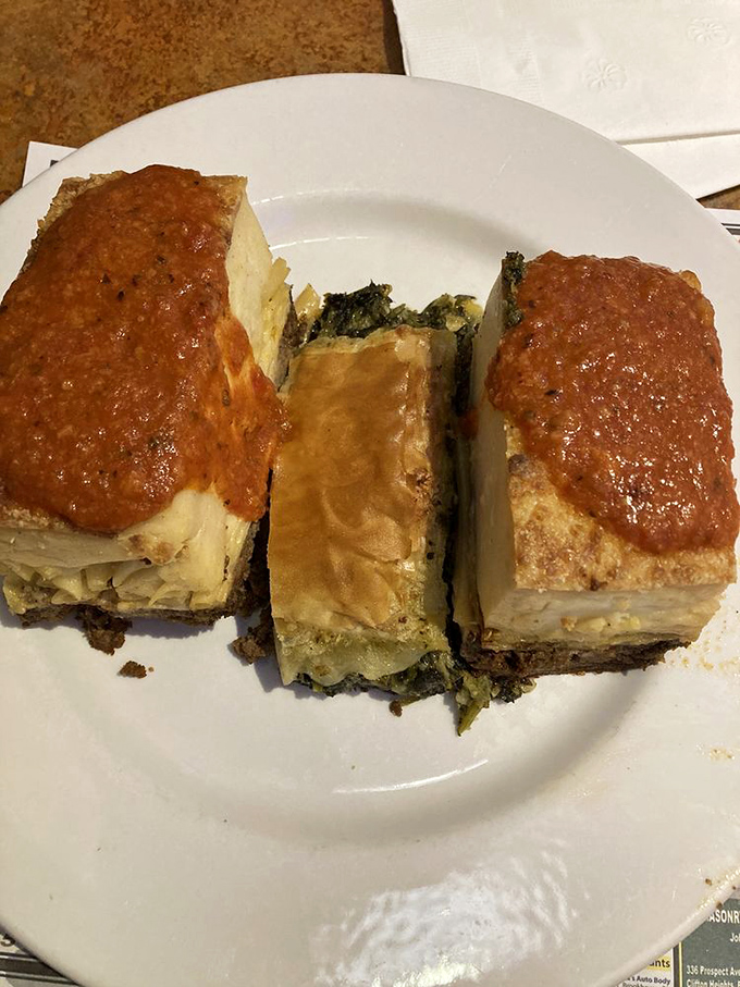 Moussaka that transports you straight to Greece without the airfare&mdash;layers of eggplant, meat, and b&eacute;chamel sauce creating a perfect harmony on the plate.