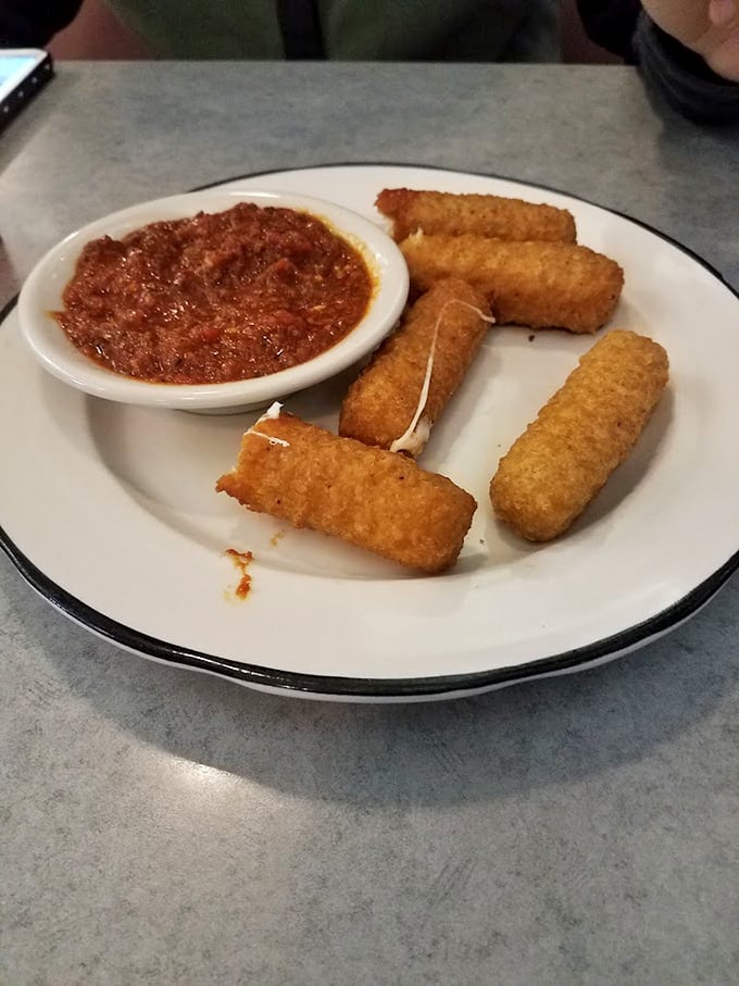 Mozzarella sticks with marinara: proof that some of life's greatest pleasures come in golden-fried packages with dipping sauce on the side.