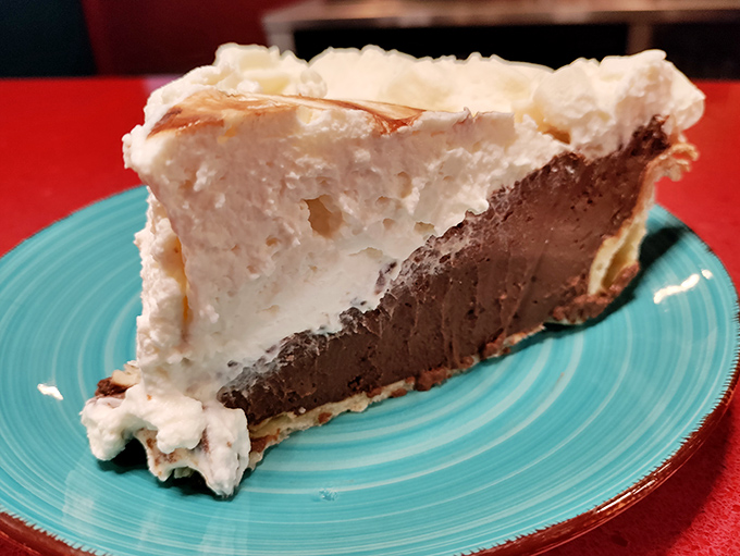Chocolate cream pie that makes you question all your dessert loyalties. That towering meringue is what cloud-based dreams are made of.