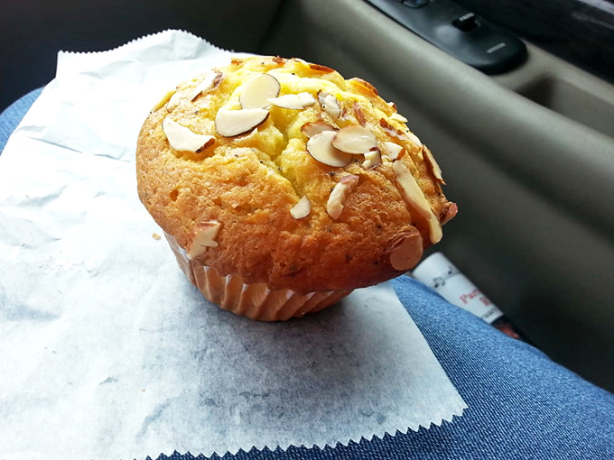 The humble almond muffin, sitting regally on its paper throne. One bite and you'll understand why breakfast pastries deserve their own food group.