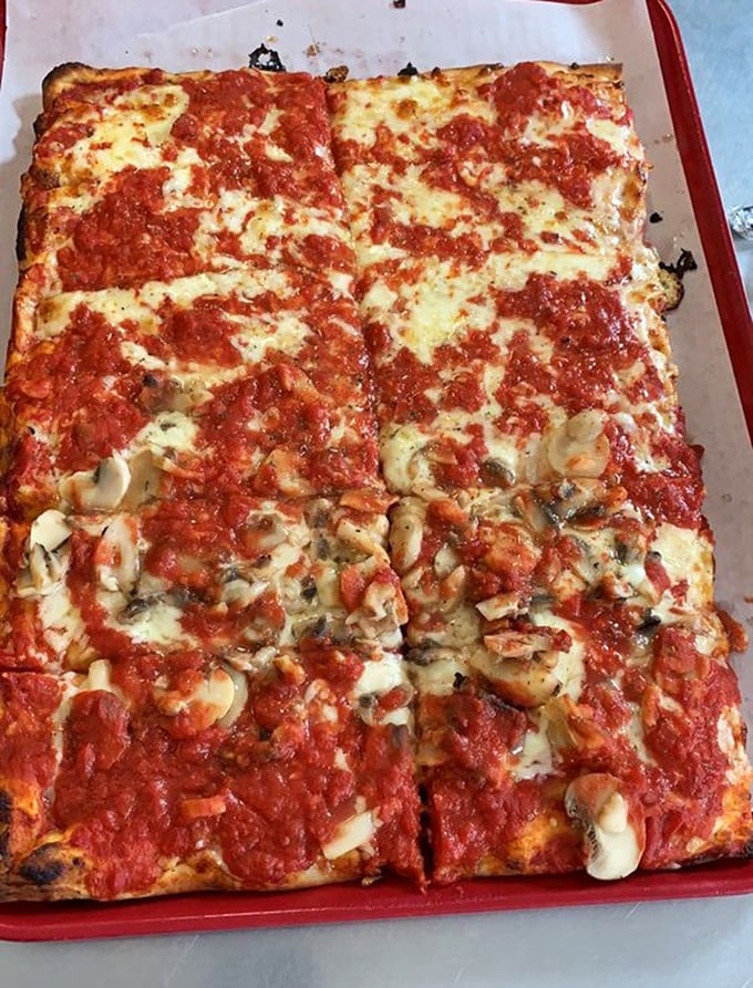 Square-cut perfection: this mushroom pizza proves that geometry and gastronomy make beautiful partners in the hands of pizza artisans.