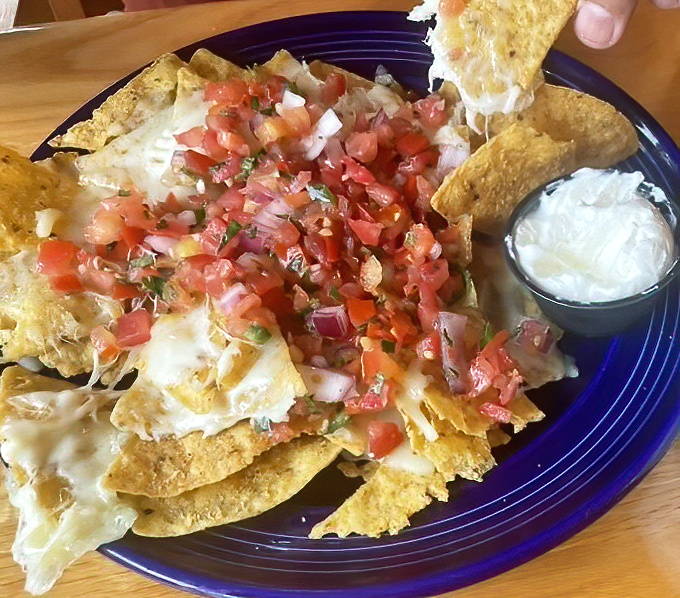 These nachos aren't messing around&mdash;they're serious business with fresh pico de gallo that brings a garden-fresh brightness to each crunchy bite.