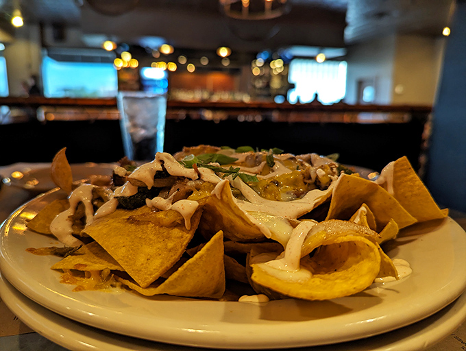 Nachos reimagined&mdash;crispy tortilla chips piled high with toppings that transform a bar snack into a legitimate dinner option.