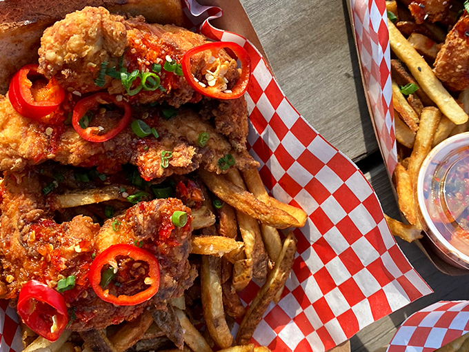 Hot chicken and fries that don't just speak &ndash; they sing in a spicy chorus that makes your taste buds do the Tennessee two-step.