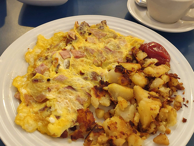 This ham and cheese omelet doesn't just satisfy hunger&mdash;it creates memories. The potatoes are merely the supporting cast in this breakfast drama.