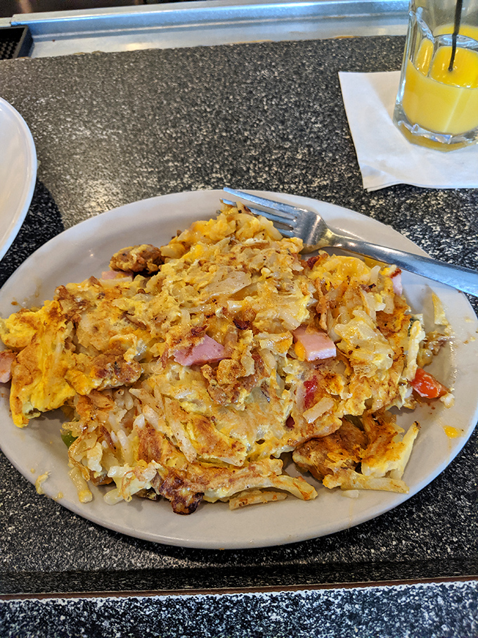 An omelet so packed with goodies it's practically a Pittsburgh neighborhood block party on a plate.