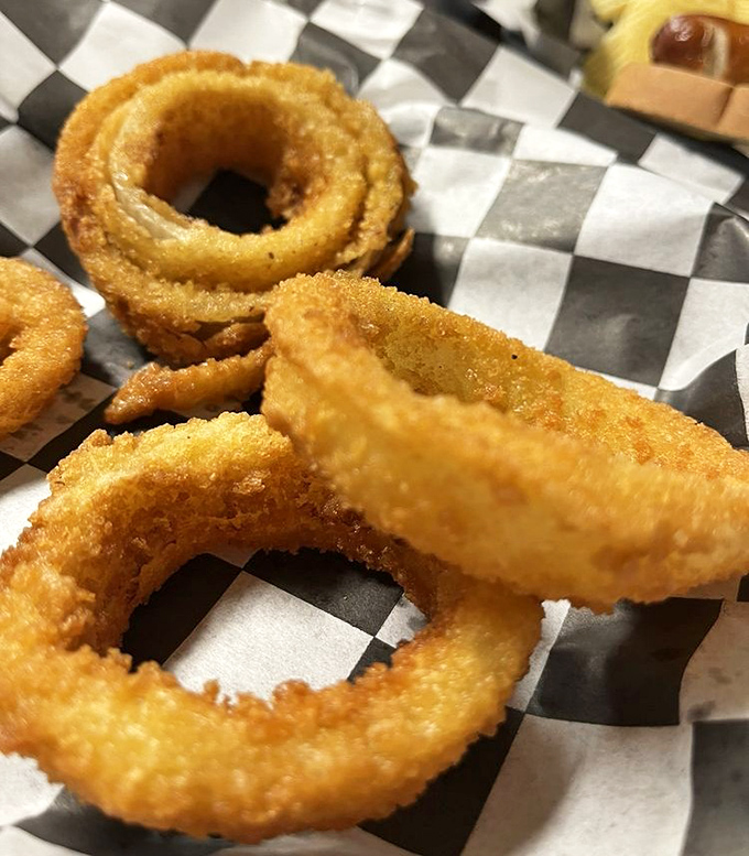 Golden, crispy onion rings that shatter with each bite &ndash; the kind that make you wonder why anyone bothers with fancy appetizers when perfection is this simple.