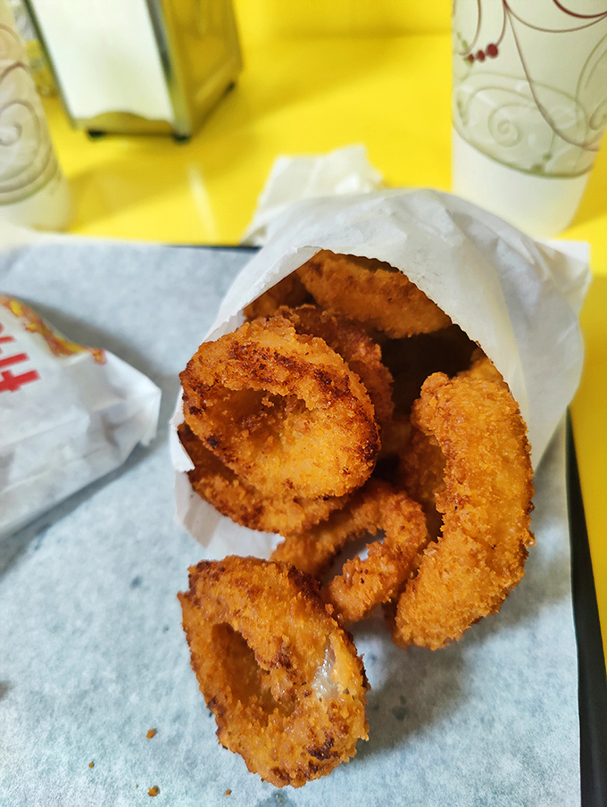 Onion rings with the structural integrity to support your wildest dipping fantasies, golden-armored and ready for battle.