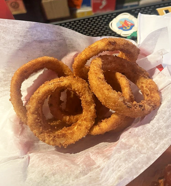 Onion rings with the perfect crunch-to-tenderness ratio &ndash; golden halos that make you wonder why anyone bothers with lesser versions.