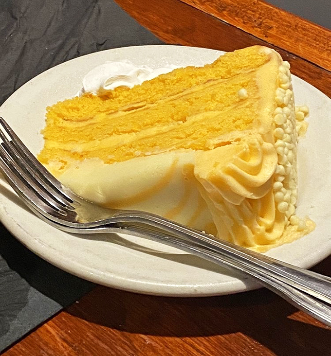 Layer upon golden layer of cake with buttercream frosting that makes you understand why people used to lick the beaters despite raw egg warnings.