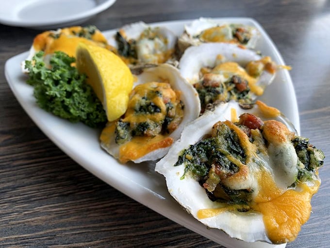 Oysters Rockefeller bringing the drama&mdash;these bivalves dressed in their Sunday best with spinach, cheese, and a hint of decadence.