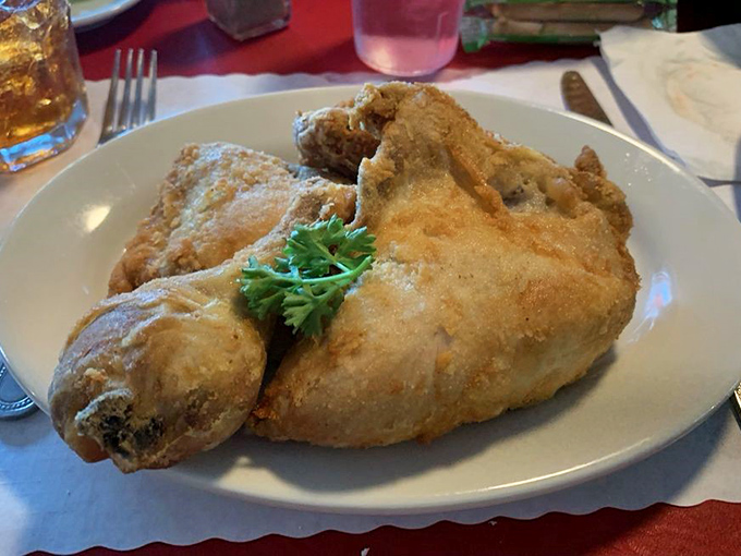 The legendary pan-fried chicken—crispy exterior giving way to juicy meat that practically falls off the bone. This isn't just dinner; it's edible nostalgia.