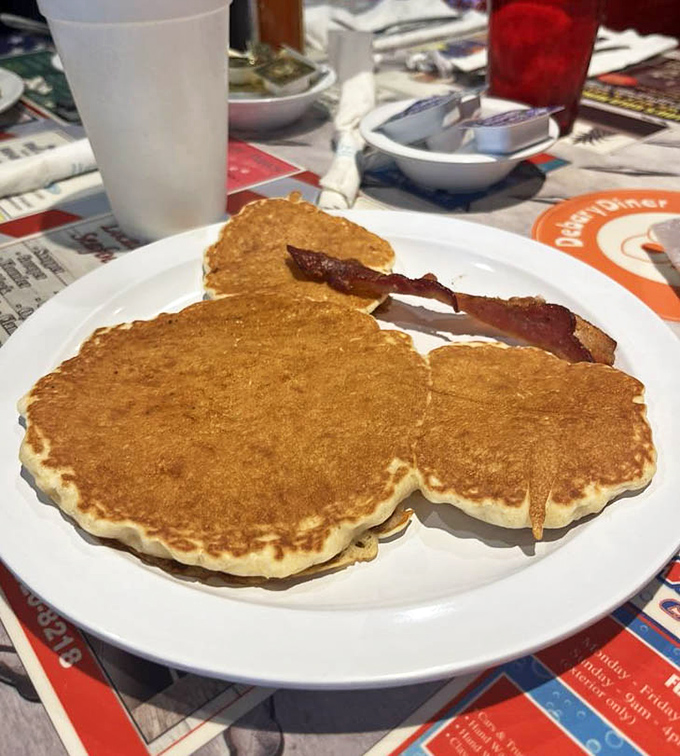 Pancakes so perfectly golden they belong in Fort Knox. The kind that make you question why you ever settled for frozen waffles.