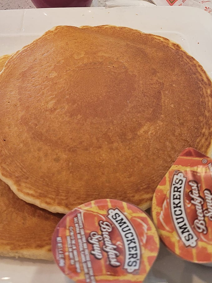 Pancakes so perfectly golden they make you wonder if the chef has some sort of pancake protractor to achieve this flawless circle.