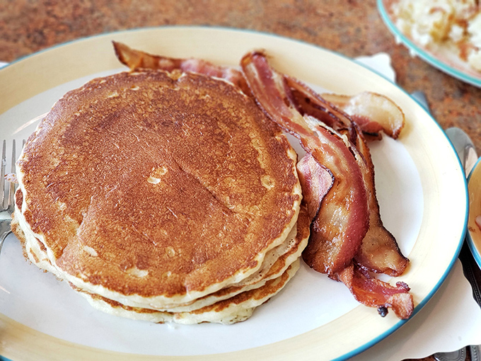 These pancakes achieve that mythical balance—crisp edges, fluffy centers—that has launched a thousand breakfast pilgrimages to Arlington.