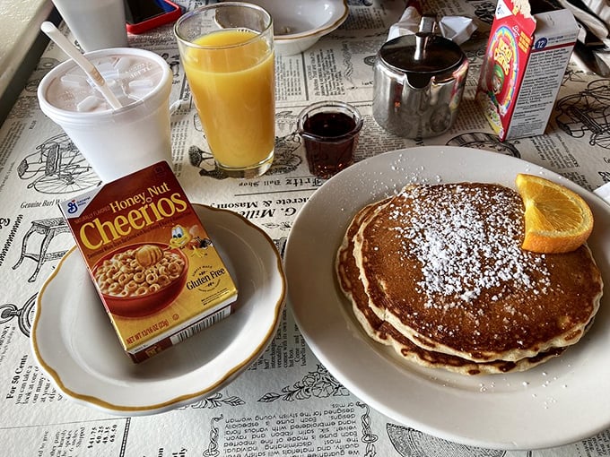Pancakes so perfectly golden they deserve their own sunrise, served with the kind of breakfast sides that make morning people out of night owls.