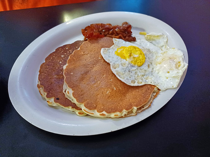 Pancakes so perfectly golden they make you wonder if the sun itself had a hand in their creation.