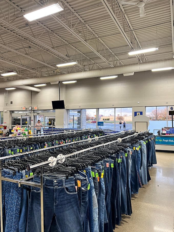The denim section&mdash;a sea of blues arranged with military precision&mdash;where your perfect pair of jeans awaits at a fraction of mall prices.