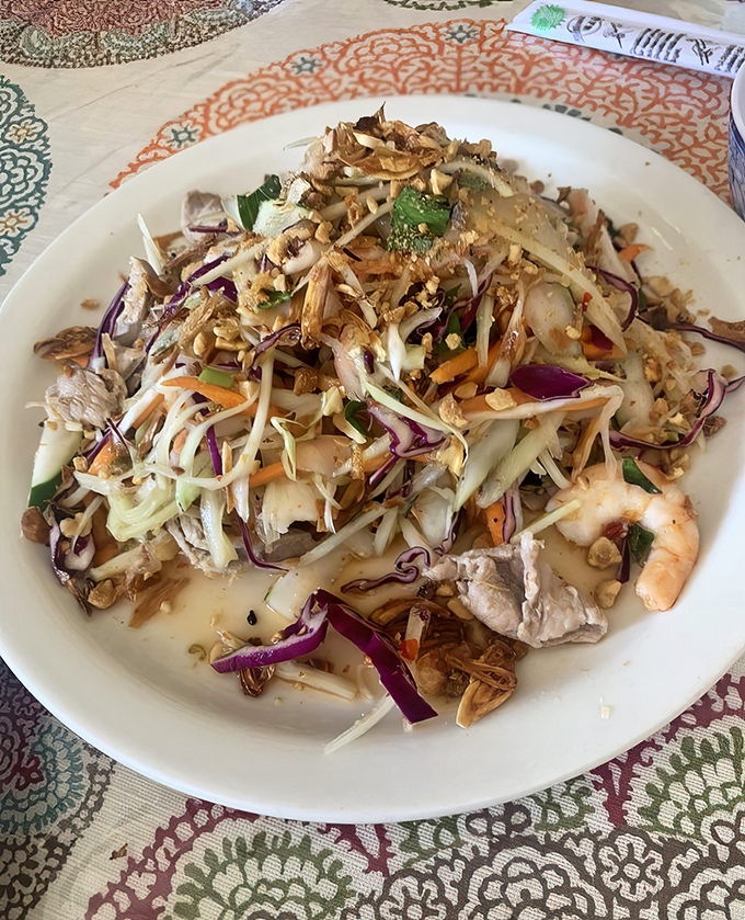 This papaya salad brings crunch, color, and enough flavor complexity to make your taste buds write thank-you notes.