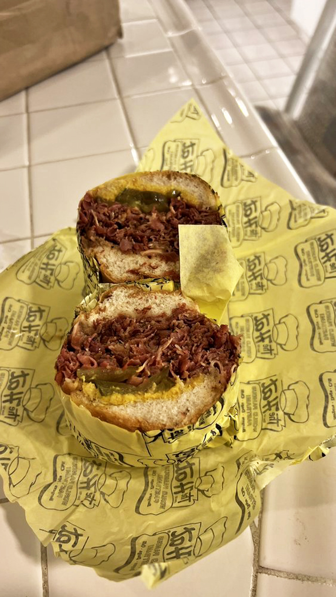 The pastrami sandwich in its natural habitat &ndash; wrapped in yellow paper that barely contains what might be California's most perfect sandwich.