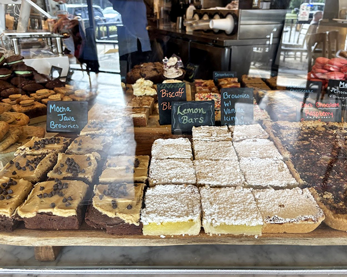 The pastry case – where willpower goes to die and "I'll just have coffee" turns into "and one of each, please."