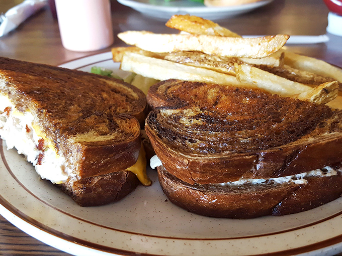 The patty melt&mdash;where bread meets beef in a marriage officiated by melted cheese. A sandwich that demands both hands and your full attention.