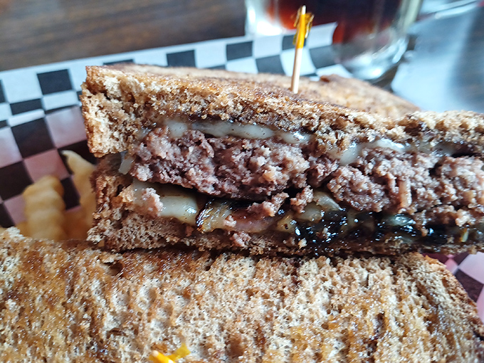 The patty melt at Fins performs the perfect dance between beef, melted cheese, and grilled bread&mdash;a sandwich that demands to be savored.