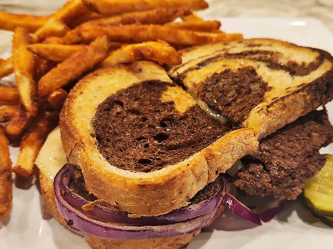 A patty melt that doesn't need to show off. Just honest beef, melted cheese, and grilled rye bread with perfectly crisp fries.
