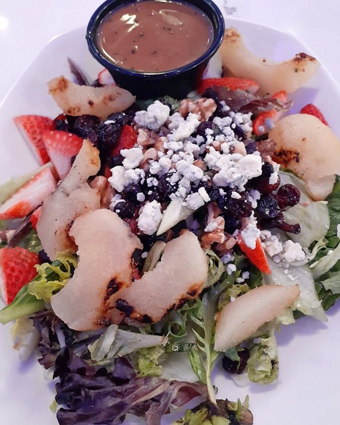 A salad that actually makes you forget you're eating healthy. Those berries and feta are having a party, and your taste buds are invited.
