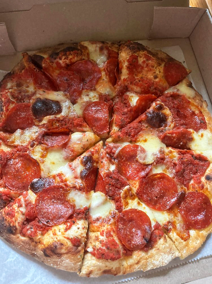 Pizza perfection isn't complicated &ndash; just quality ingredients and a brick oven that knows what it's doing. The charred edges tell you everything you need to know.