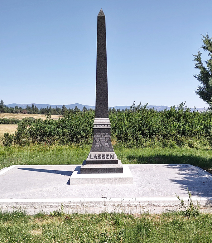 This monument marks where pioneer Peter Lassen's journey ended, surrounded by the wilderness he helped open.
