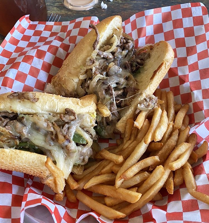 The Philly cheesesteak that dares to venture west &ndash; tender beef, melted cheese, and grilled onions creating that perfect sandwich harmony that transcends geography.