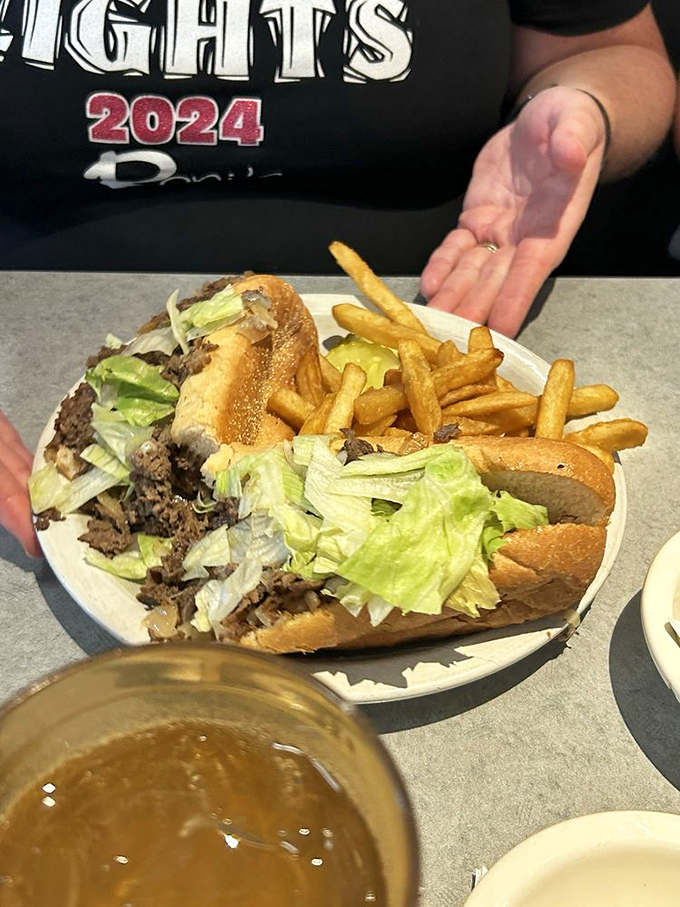 The Philly cheesesteak&mdash;a sandwich so serious about its mission to satisfy that it brings reinforcements in the form of crispy fries and fresh veggies.
