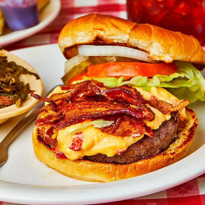 This burger's got more layers than a Tennessee bluegrass ballad &ndash; pimento cheese and bacon stealing the show.
