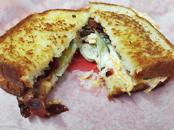 The grilled pimento cheese sandwich—where bread meets cheese in a golden-brown romance that would make Shakespeare write sonnets about lunch.