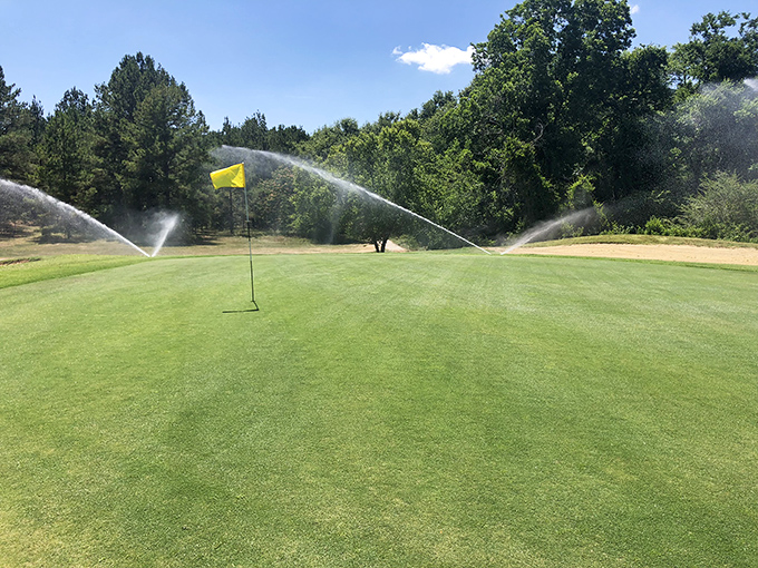 Those sprinklers aren't just watering the green&mdash;they're performing a synchronized dance across Pine Hills Country Club's immaculate golf course.