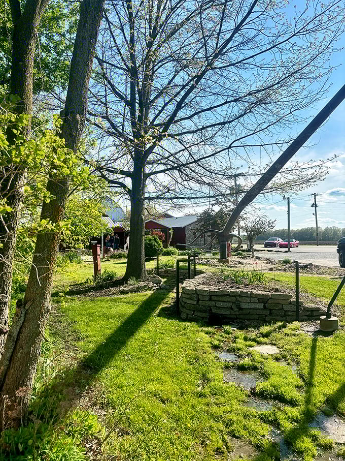 Peeking through the trees like some mythical giant's forgotten tool, the pitchfork creates a surreal silhouette against the rural backdrop.