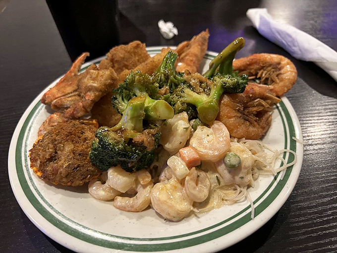 A seafood lover's dream team assembled on one plate. Crispy shrimp, tender broccoli, and creamy pasta salad play together like old friends.