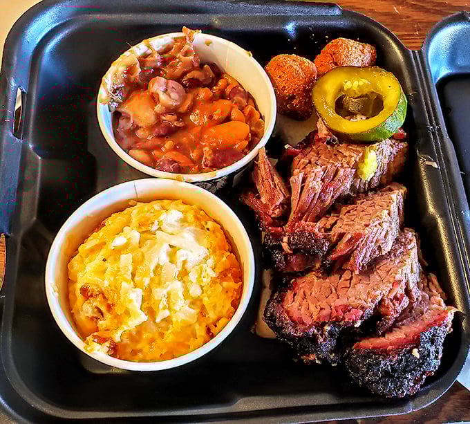 When your plate needs dividers to maintain peace between competing deliciousness. The mac and cheese and baked beans are having their own flavor summit.