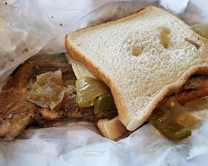 The pork chop sandwich with green peppers isn't just a meal, it's a Delaware tradition wrapped in wax paper and destined for your food memories.