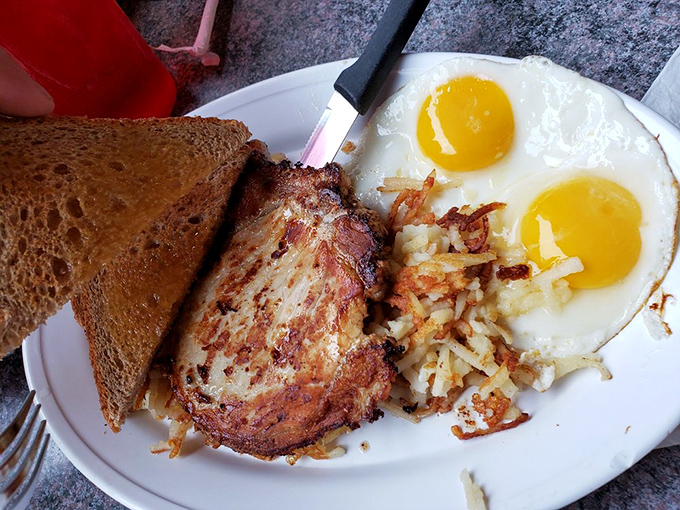Pork chop, eggs, and hash browns &ndash; the holy trinity of breakfast that's converted more food sinners than any religion ever could.
