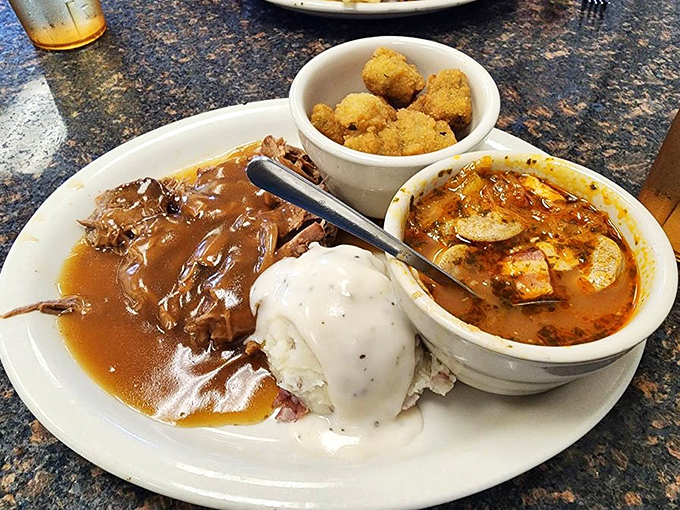 Pot roast that doesn't need a fancy introduction&mdash;just a hungry audience. Those mashed potatoes wearing a gravy hat are the supporting actors who steal the show.