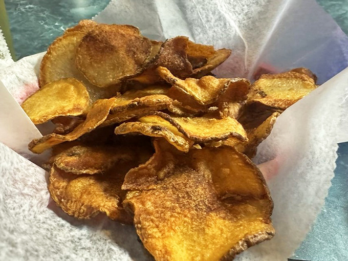 House-made potato chips that render the bagged variety obsolete. Each one a crispy, salty little disc of potato perfection.