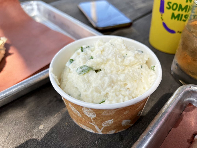 This isn't your aunt's bland potato salad. It's creamy, herb-flecked comfort that makes you wonder why you ever bothered with other sides.