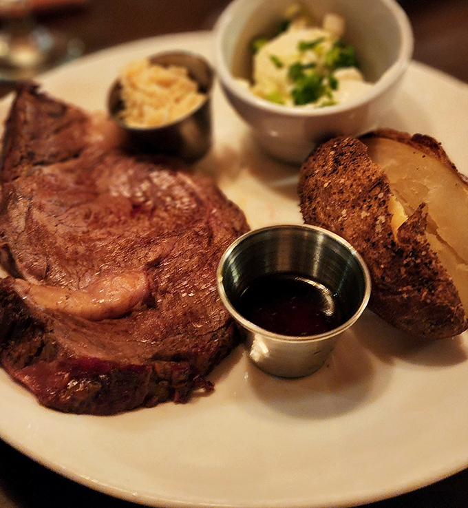 The prime rib doesn't just sit on the plate &ndash; it commands attention, flanked by sides that know their supporting role in this meaty masterpiece.