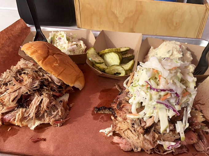 Pulled pork so tender it practically pulled itself, paired with sides that refuse to be mere afterthoughts.
