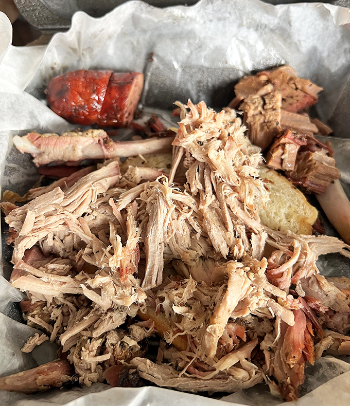 Pulled pork perfection&mdash;tender strands of smoky goodness ready for a sandwich, a fork, or honestly, just your eager fingers. No judgment here.