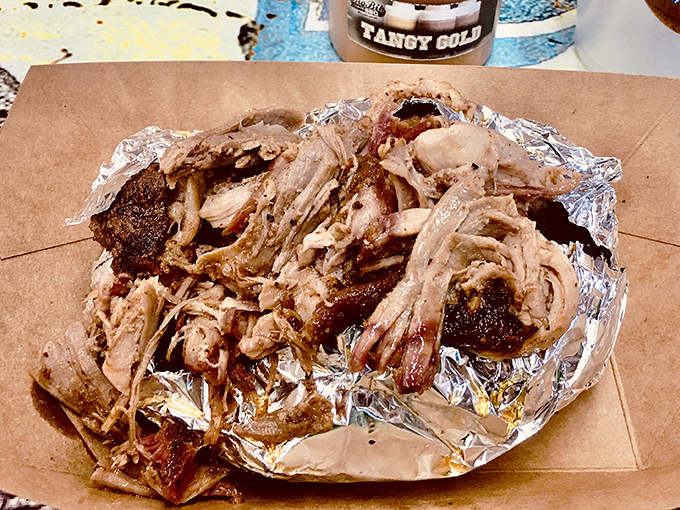 Pulled pork that doesn't so much fall apart as surrender completely to its delicious destiny. Foil can't contain this level of smoky perfection.