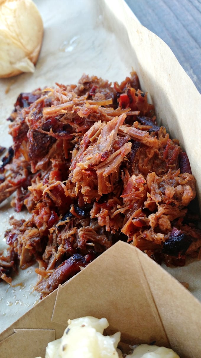 This pulled pork doesn't just fall apart&mdash;it practically disintegrates with a gentle nudge, revealing strands of smoky perfection ready for their close-up.