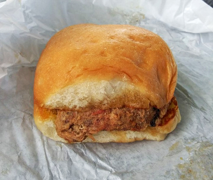 Pulled pork piled high enough to require structural engineering and a game plan for eating.